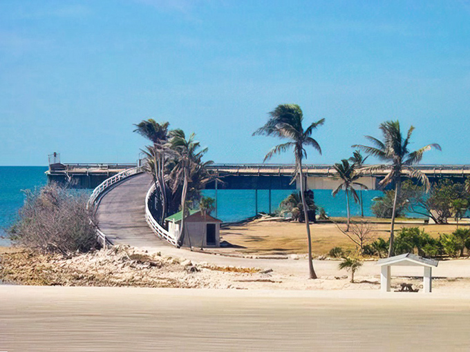 The pedestrian path stretches toward the horizon, inviting visitors to literally walk above the ocean on this remarkable historic thoroughfare.
