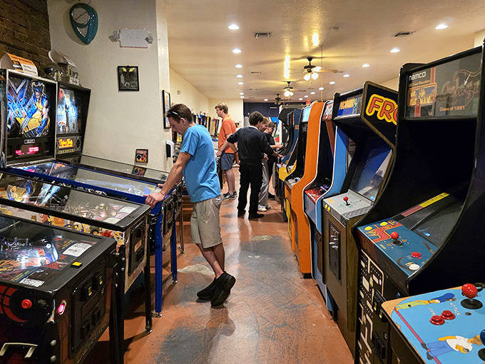 Gaming brings people together at Replay, where strangers become temporary teammates united by the universal language of high scores.