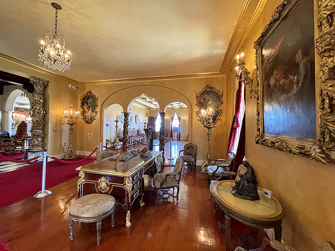 Ca' d'Zan's opulent interior showcases Gilded Age excess, where European antiques meet Jazz Age glamour under sparkling chandeliers.