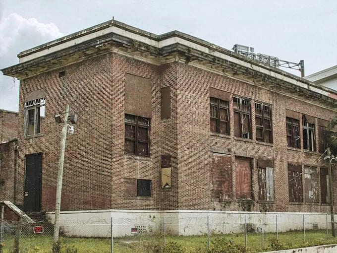 The side view reveals the building's substantial footprint, a reminder that communities once invested in education with the same enthusiasm we now reserve for stadiums.