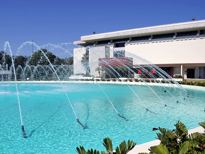 The Water Dome fountain dances and sparkles, celebrating the simple joy of water defying gravity in geometric patterns all day.