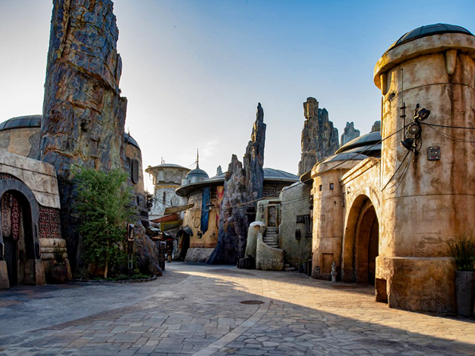 The weathered architecture and towering spires of Batuu create the perfect backdrop for your journey to this far-flung corner of space.