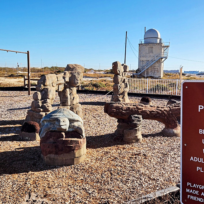 Not your average playground &ndash; these driftwood sculptures and the lighthouse backdrop make jungle gyms seem tragically ordinary.