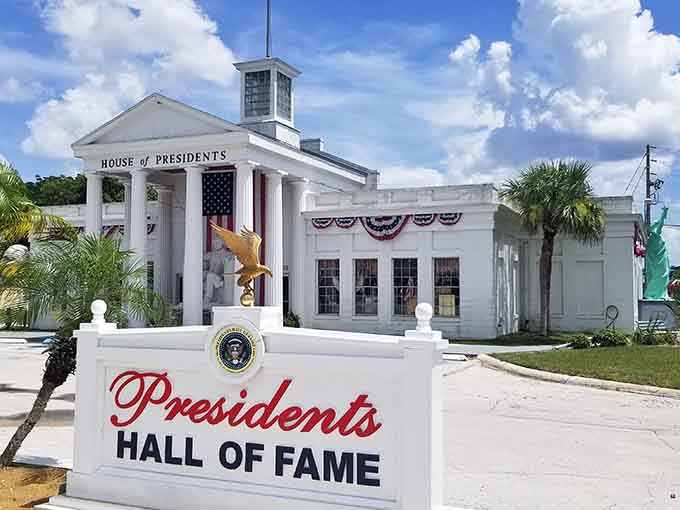 The full exterior view shows off the classical architecture and patriotic flair that makes this place impossible to miss, like a beacon of presidential history along the highway.