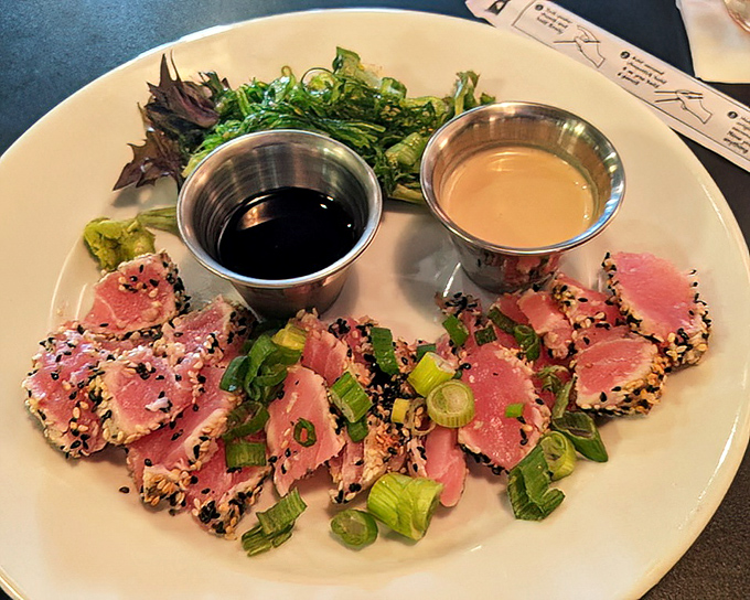 Seared tuna that's been cooked to that perfect rare temperature, because overcooking good fish should honestly be against the law.