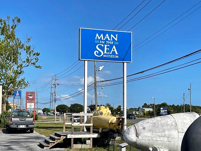 The Museum of Man in the Sea sign stands tall against the Florida sky, beckoning curious minds to discover the mysteries of the deep without getting their feet wet.