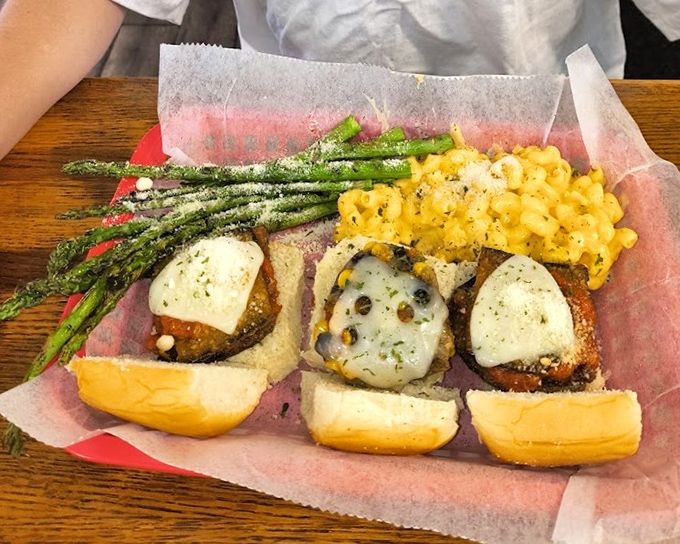 A slider trio with asparagus and mac & cheese &ndash; the kind of plate that makes you wonder why all restaurants don't think this way.
