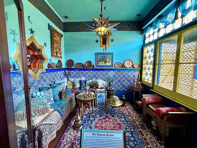 The Harem Room features vibrant turquoise walls and authentic furnishings that transport you straight to a Moroccan palace, minus the actual Morocco.