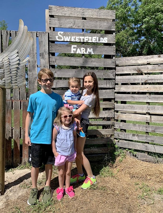 Creating memories at the entrance sign &ndash; because the best souvenirs are the moments you'll remember long after leaving.