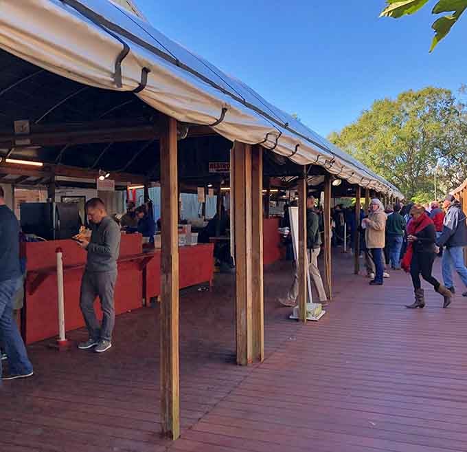 The Sunday market buzzes with hungry visitors lining up for authentic Thai dishes at prices that seem too good to be true.