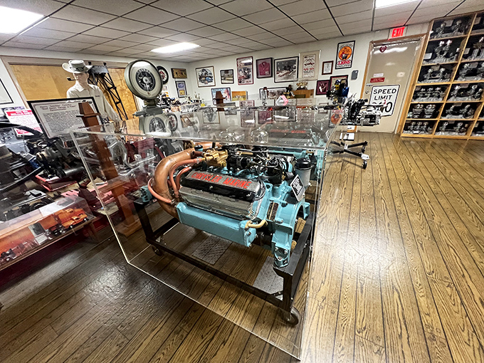 This meticulously preserved engine sits like a mechanical heart outside its body, every polished part a testament to engineering artistry.