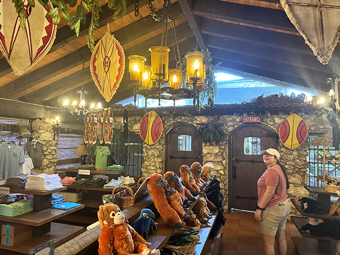 The gift shop's interior showcases tribal-inspired decor and plush primate souvenirs, where conservation education meets memorable keepsakes.