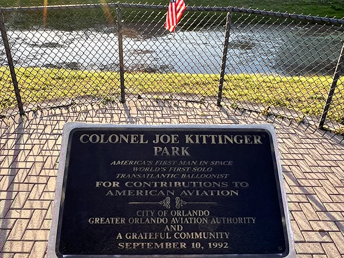This memorial plaque tells more than dates and accomplishments – it speaks of courage, innovation, and the boundless human spirit.