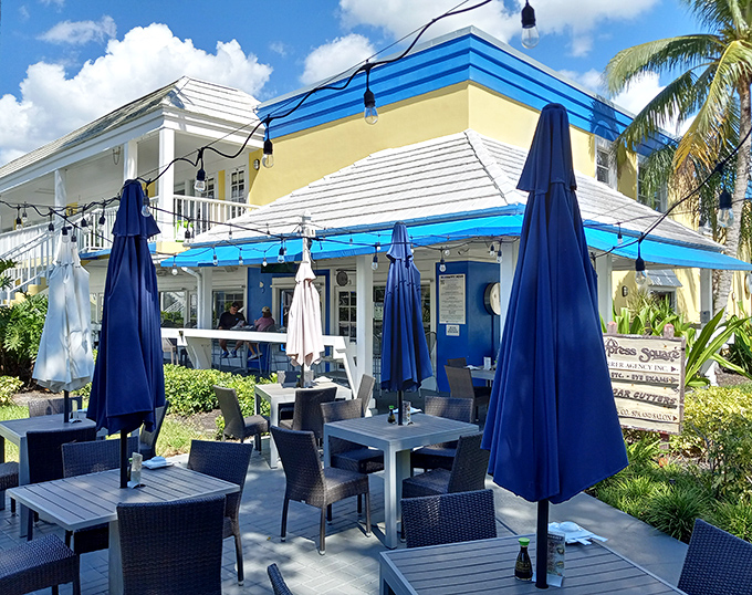 Under blue umbrellas and Florida skies, the patio offers al fresco dining that somehow feels both part of the street scene and a tranquil escape.