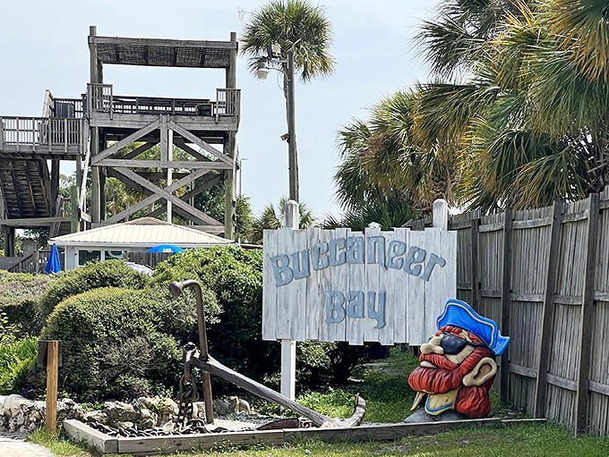 Buccaneer Bay's weathered sign and pirate mascot welcome visitors to this unique water park, promising adventures that only Florida springs can deliver.