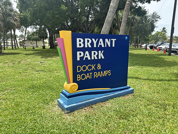 The colorful park signage welcomes visitors to this waterfront gem, highlighting the boat ramps that provide direct water access.