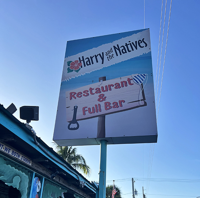 That sign isn't just announcing a restaurant&mdash;it's a landmark, a beacon guiding hungry travelers to a taste of authentic Florida under that iconic thatched roof.