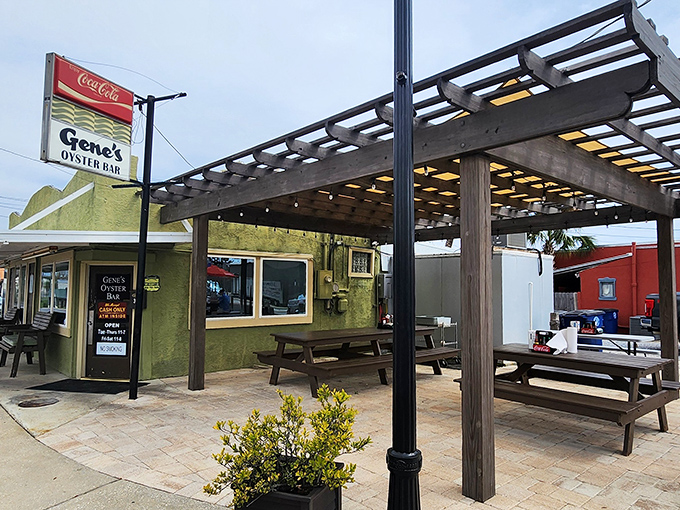 Gene's modest green exterior hides a treasure trove of oyster excellence. The vintage Coca-Cola sign signals you've found a true local institution.