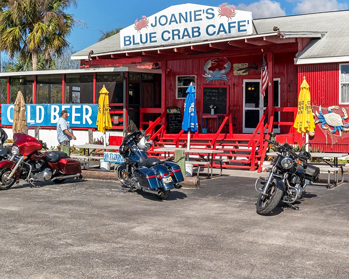 Joanie's Blue Crab Cafe's vibrant red exterior stands out in the Everglades like a delicious mirage for hungry travelers and bikers.