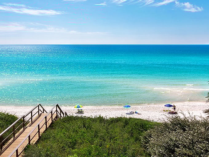 Stairway to paradise! Santa Rosa Beach's wooden boardwalk leads to waters so turquoise they look Photoshopped, but trust me, that color is 100% Florida magic.