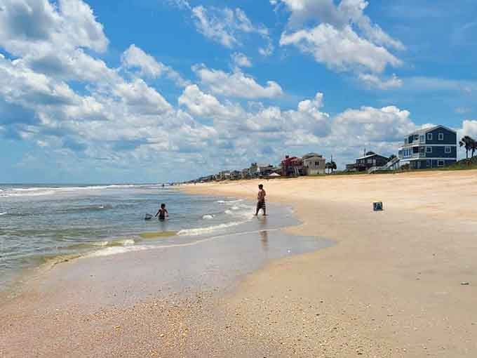 Usina Beach stretches out in golden splendor, with beach houses dotting the coastline and hardly a soul in sight.