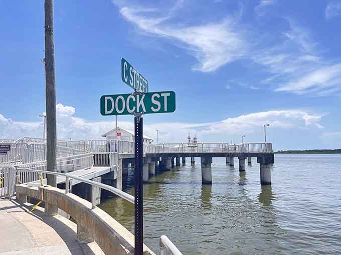A street sign marks Dock Street at Cedar Key, where fishing adventures and island charm await.