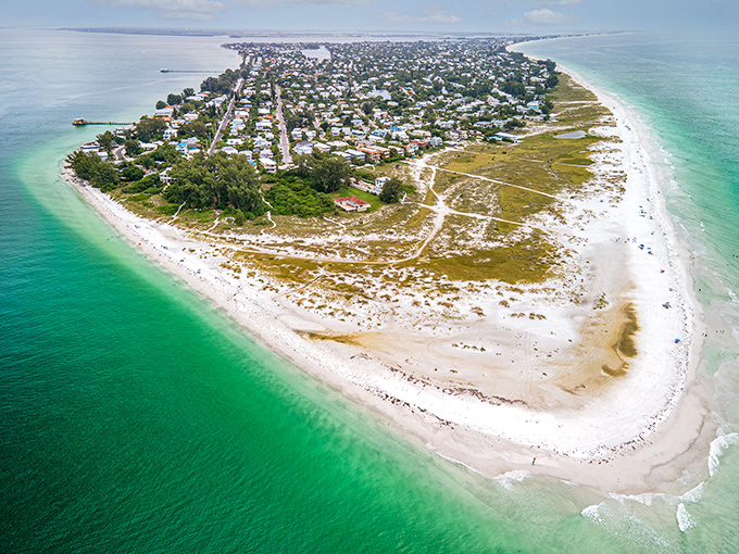 The island's northern tip looks like Mother Nature's attempt at creating the perfect beach peninsula. Spoiler alert: she nailed it.