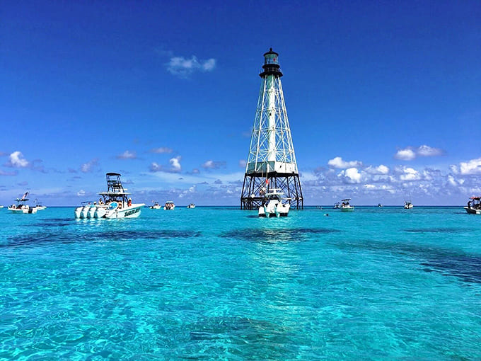 When the lighthouse becomes the most popular meeting spot in town, you know you've found something special in these turquoise waters.