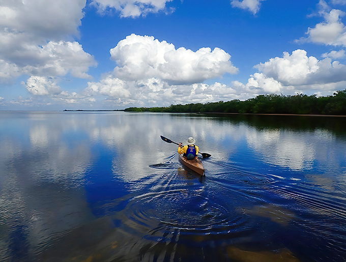 Mirror-like waters reflect clouds so perfectly, paddlers might wonder if they've somehow flipped upside down without getting wet.