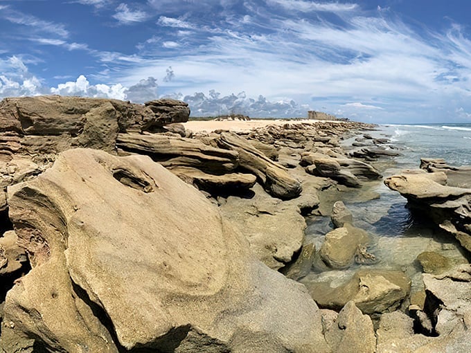 Layers of ancient coquina tell Earth's story while waves provide the soundtrack to this coastal masterpiece.