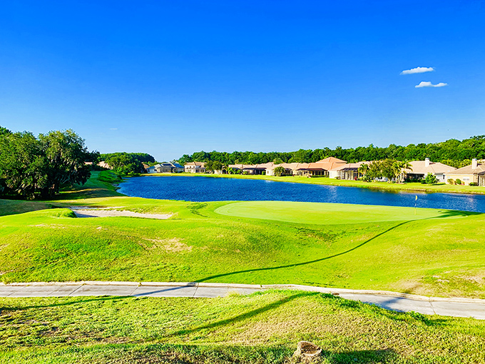 Emerald fairways stretch toward azure waters, creating a golfer's paradise where precision meets beauty at every turn.