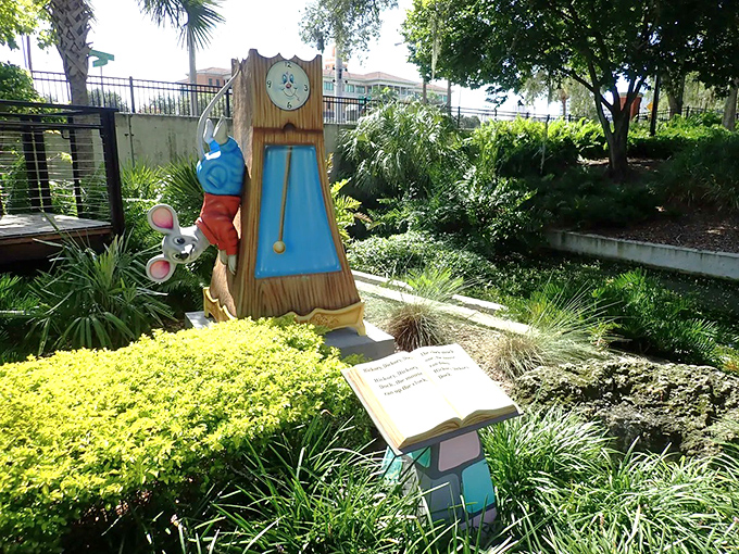 The Hickory Dickory Dock clock tower features a determined mouse climbing toward adventure, forever frozen in mid-ascent.