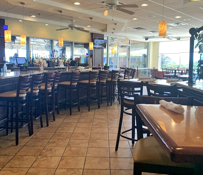 Shuckers' welcoming interior bar area offers cool refuge from Florida heat without sacrificing those ocean views.
