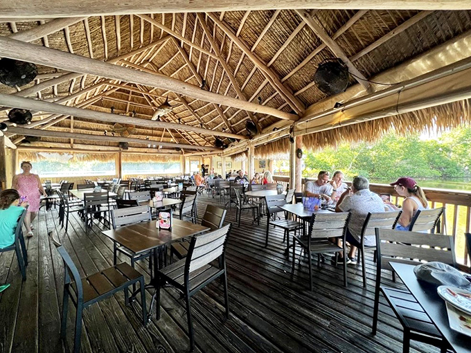 Rustic wooden beams and soaring thatched ceilings create an atmosphere where time slows down and vacation mode kicks in instantly.