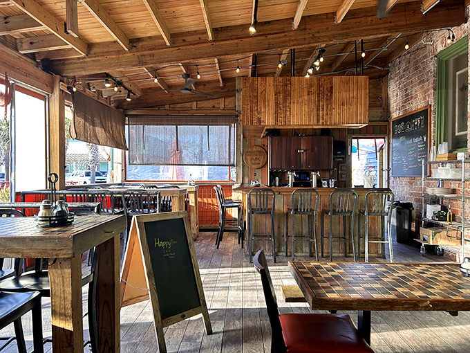 Exposed brick meets wooden beams in this rustic haven where conversations flow as freely as the craft beer.