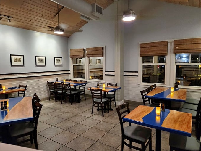 Clean lines and nautical blues create a dining room that whispers "upscale" while still welcoming sandy flip-flops.