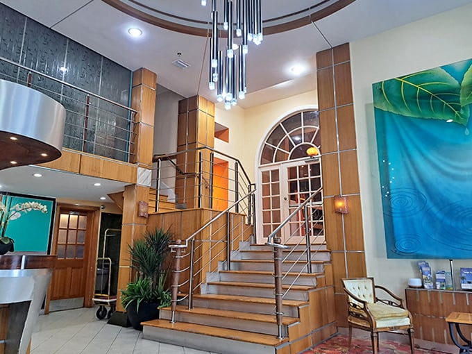 This isn't just a staircase&mdash;it's a dramatic entrance waiting to happen. The lobby's spiral steps practically demand you descend them while humming your personal theme music.