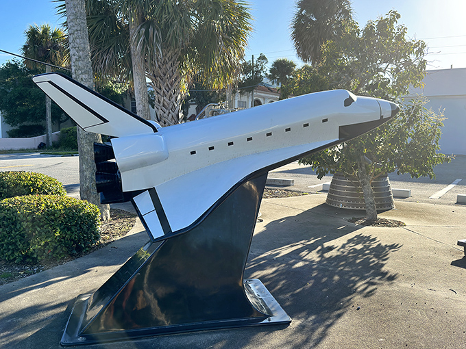 This isn't your average lawn ornament &ndash; a genuine space shuttle model stands guard outside, reminding visitors they're about to experience the real deal.