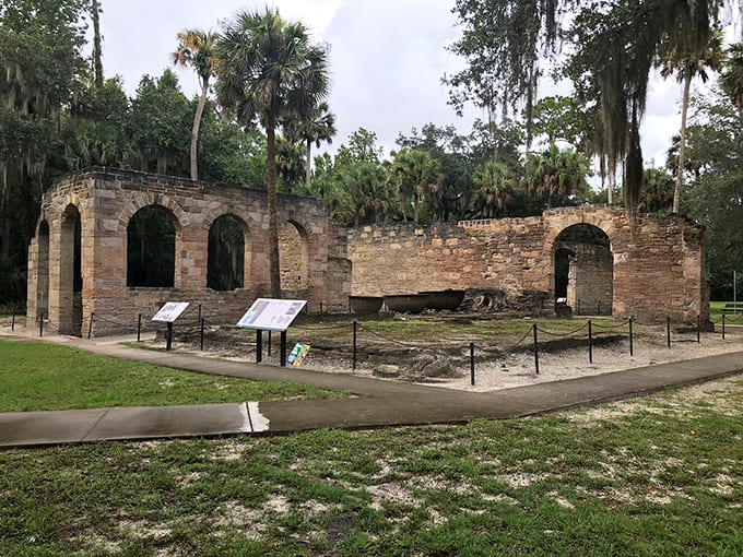 Paved pathways guide visitors through history, making these 19th-century ruins accessible to explorers of all ages and abilities.