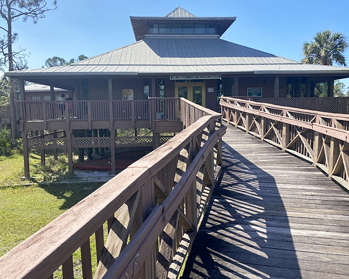 The reception building stands as nature's embassy, where wild Florida welcomes curious humans into its diplomatic relations.