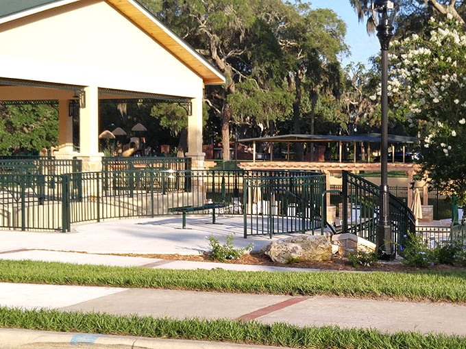 Spring Park's thoughtful design showcases the natural spring, where limestone pathways and lush landscaping frame this bubbling treasure.