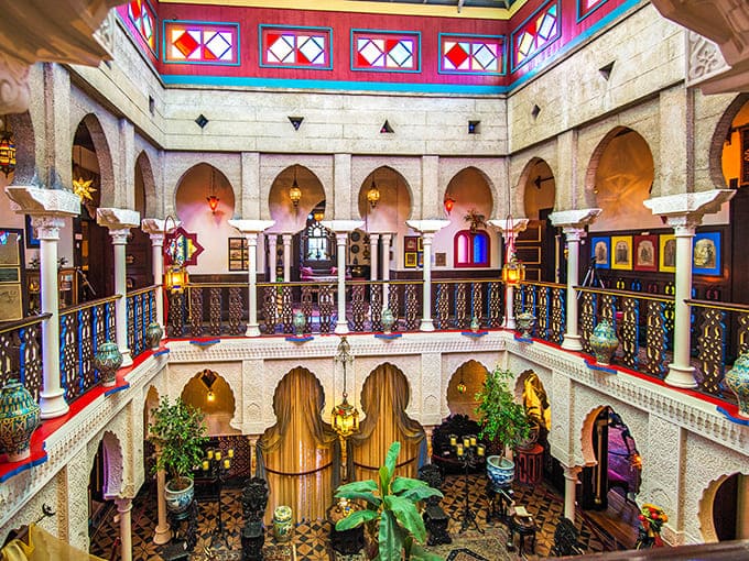 The interior courtyard features arches and balconies that would make any architecture enthusiast weak in the knees with pure design envy.