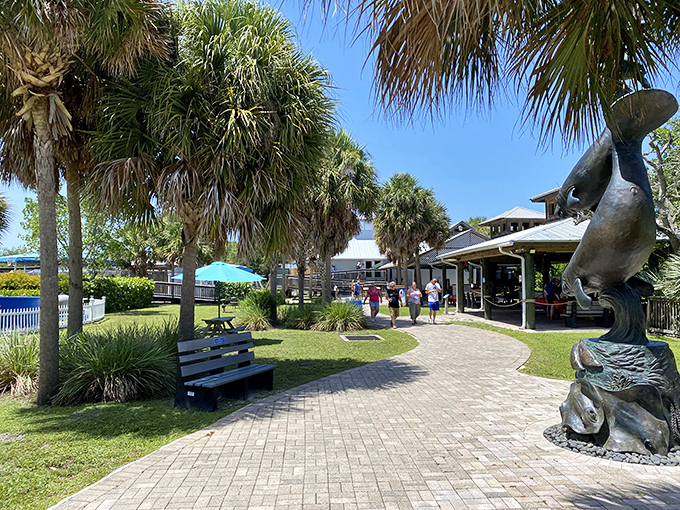 Palm trees stand sentinel along the center's pathways, offering shade and tropical vibes as visitors explore marine wonders.