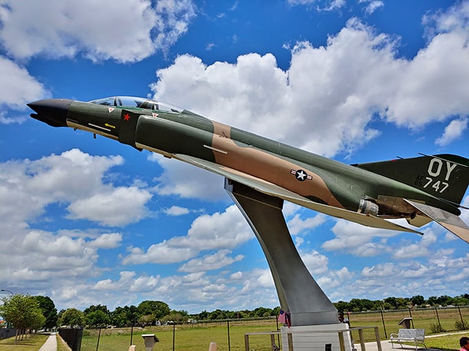 The restored F-4 Phantom aircraft stands proudly, a gleaming tribute to Colonel Kittinger's stratospheric courage and aviation legacy.