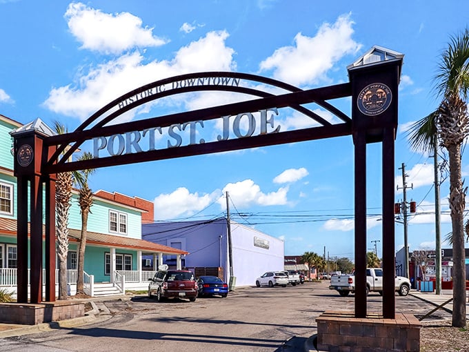 The iconic Port St. Joe archway welcomes visitors to a downtown where local shops still outnumber chains and people actually make eye contact.