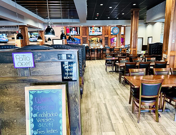 Modern meets traditional in this welcoming space where the booths are cozy and the TVs are plentiful, creating everyone's ideal dining scenario.