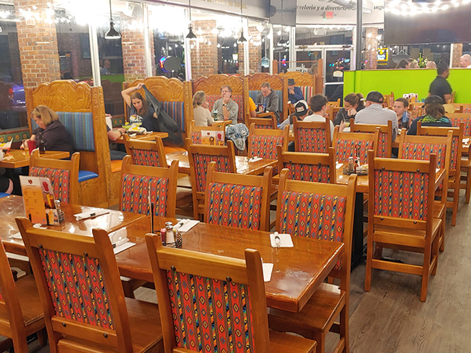 Wooden booths with vibrant upholstery create the perfect setting for family gatherings and flavor discoveries at this Leesburg hotspot.