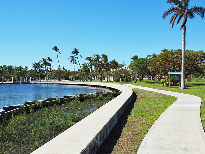 The park's winding waterfront walkway invites leisurely strolls with constant views of the shimmering Lake Worth Lagoon.