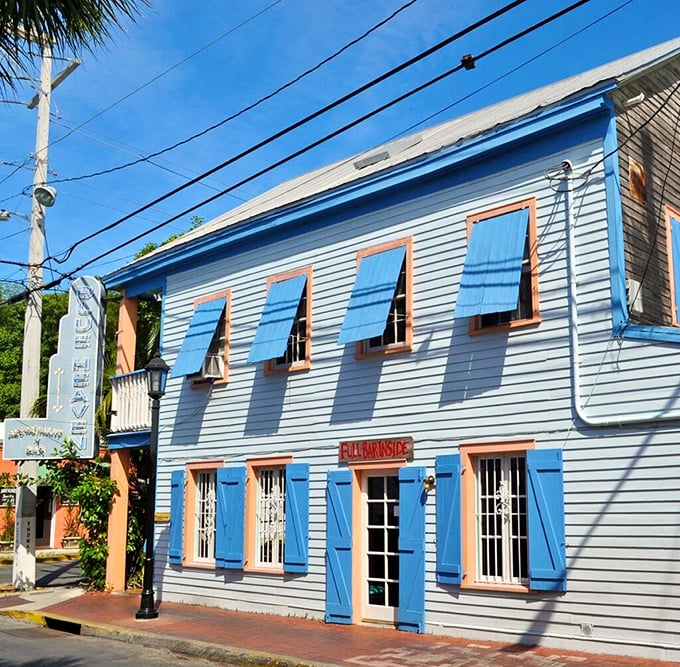 Blue Heaven's charming blue exterior with bright shutters captures Key West's laid-back spirit &ndash; just add roosters and live music for the full experience.