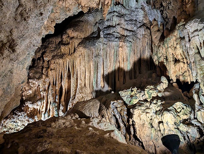 Nature's artwork on display: stalactites hang like frozen waterfalls in the cool darkness of Florida Caverns State Park.